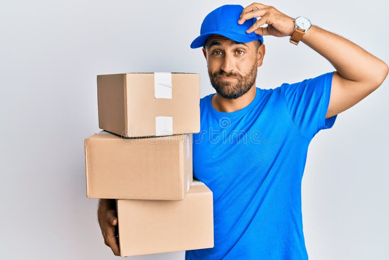 Handsome Man with Beard Wearing Courier Uniform Holding Delivery ...