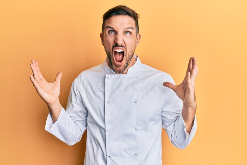 Handsome Man with Beard Wearing Professional Cook Uniform Crazy and Mad ...