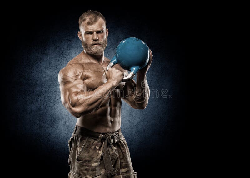 Handsome Man with Big Muscles, Posing at the Camera in the Gym Stock ...