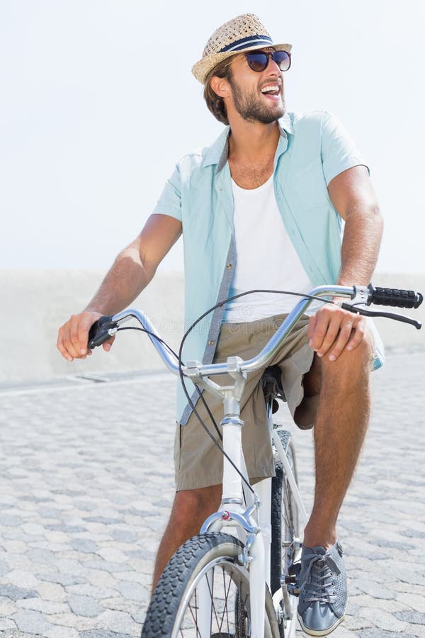 Handsome Man on a Bike Ride Stock Photo - Image of pursuit, riding ...