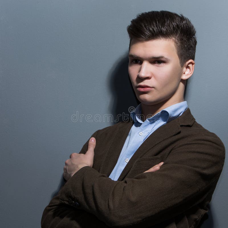 Handsome Man on Blue Background Stock Image - Image of hands, costume ...