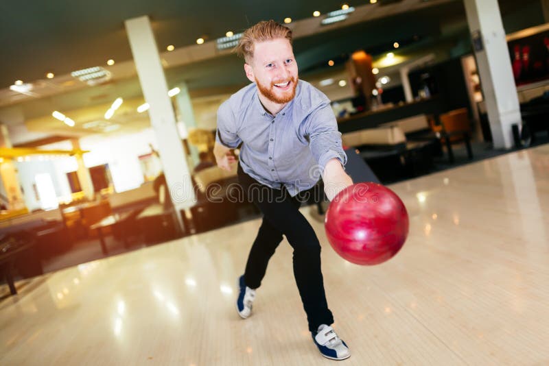 Handsome man bowling stock photo. Image of concept, active - 119409024