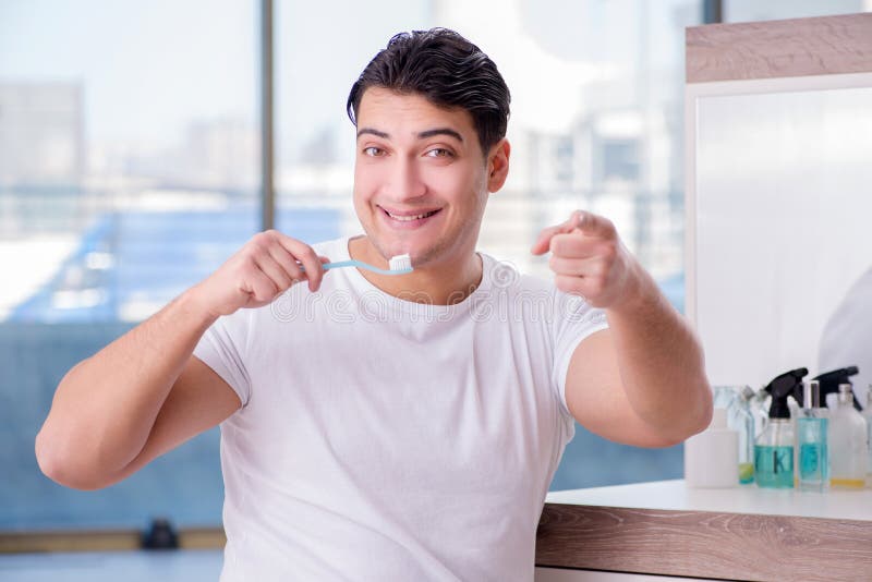 The Handsome Man Brushing Teeth in the Morning Stock Photo - Image of ...