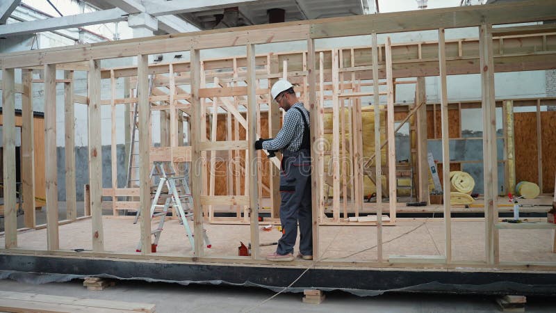 Handsome Man Builder Working at Prefabricated House Building ...