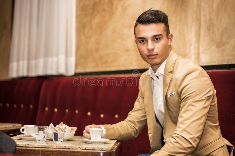 Handsome man in cafe stock image. Image of restaurant - 83167681