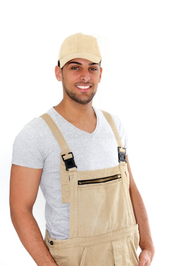 Handsome Man in Cap and Dungarees Stock Photo - Image of confident ...