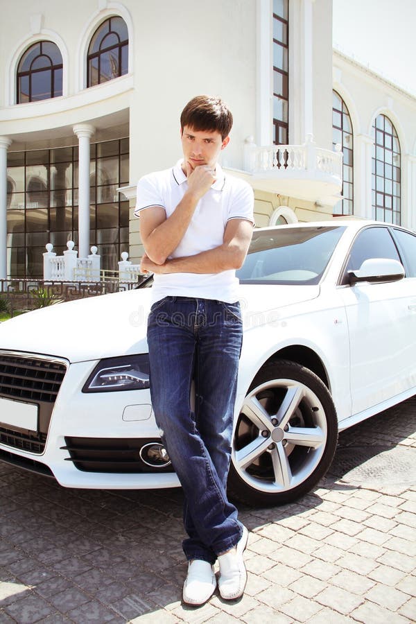 Handsome Man Leaning Against Car Stock Photo - Image of shirt, dude ...