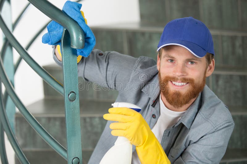 Handsome Man Cleaning Staircase in Office Stock Image - Image of ...