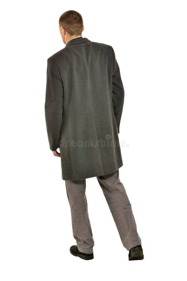 Back View of Young Stylish Man in Trench Coat Walking through Street ...