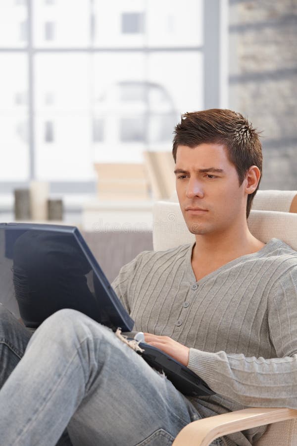 Handsome Man Concentrating on Laptop Screen Stock Photo - Image of ...