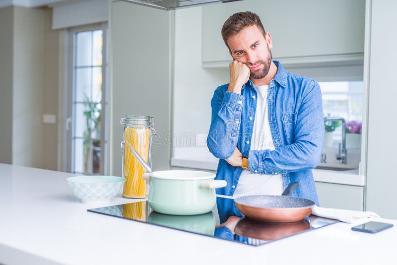 Man in Kitchen is Thinking and Writing Stock Image - Image of hand ...