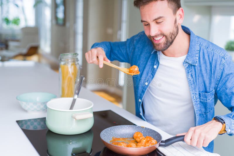 Handsome Man Cooking Pasta at Home Stock Image - Image of healthy, male ...