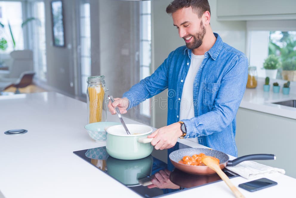 Handsome Man Cooking Pasta at Home Stock Image - Image of cooker ...