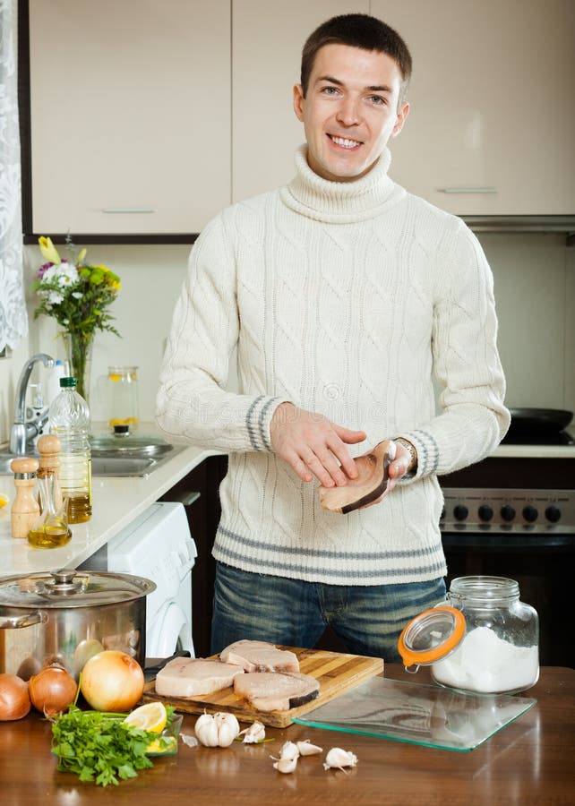 Handsome Man Cooking Steak of Fish Stock Photo - Image of porbeagle ...