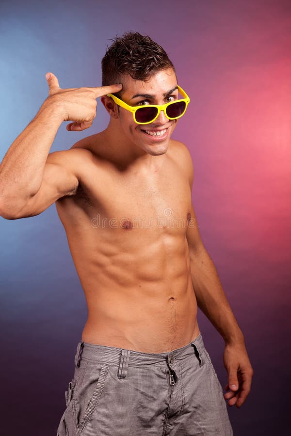 Handsome Man Crazy on Studio with Yellow Glasses Stock Photo - Image of ...