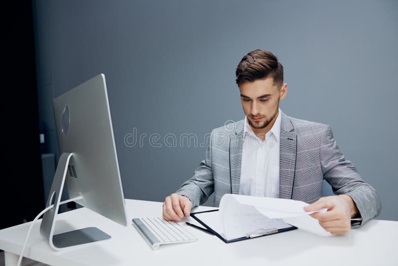 Handsome Man Documents on the Table Computer Work Emotions Executive ...