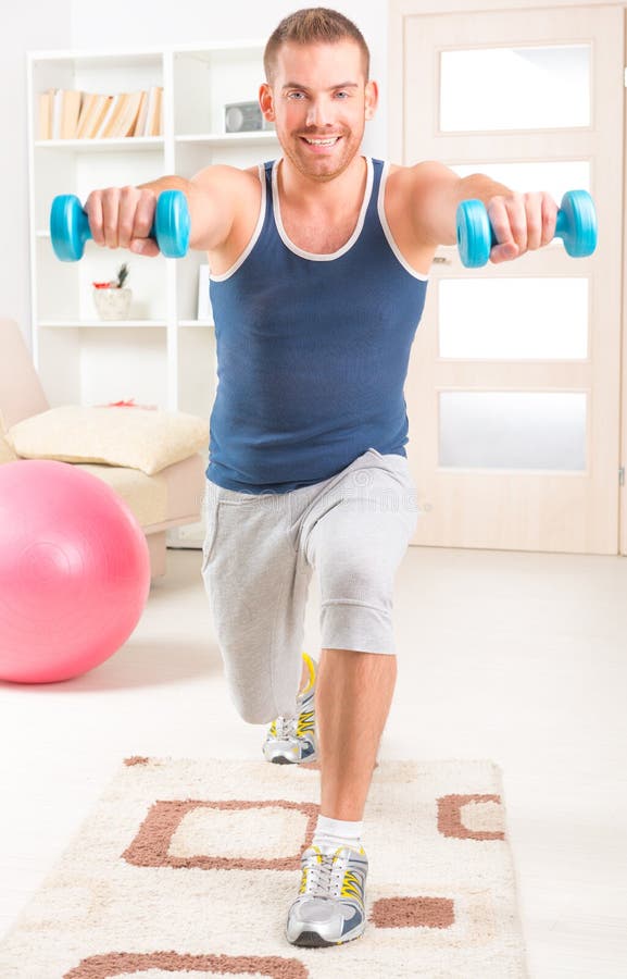 Handsome Man Doing Exercises at Home Stock Image - Image of caucasian ...