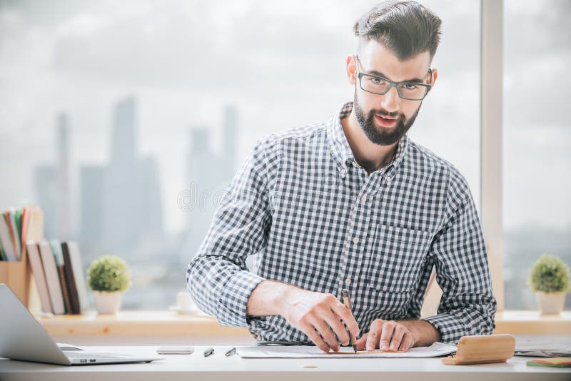 Handsome Man Doing Paperwork Stock Image - Image of desktop, examining ...
