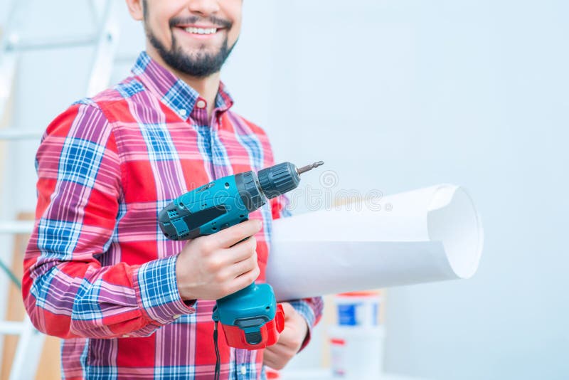 Handsome Man Doing Renovation Stock Photo - Image of helmet, coziness ...