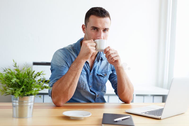 Handsome Man Drinking Coffee in the Office Stock Image - Image of ...
