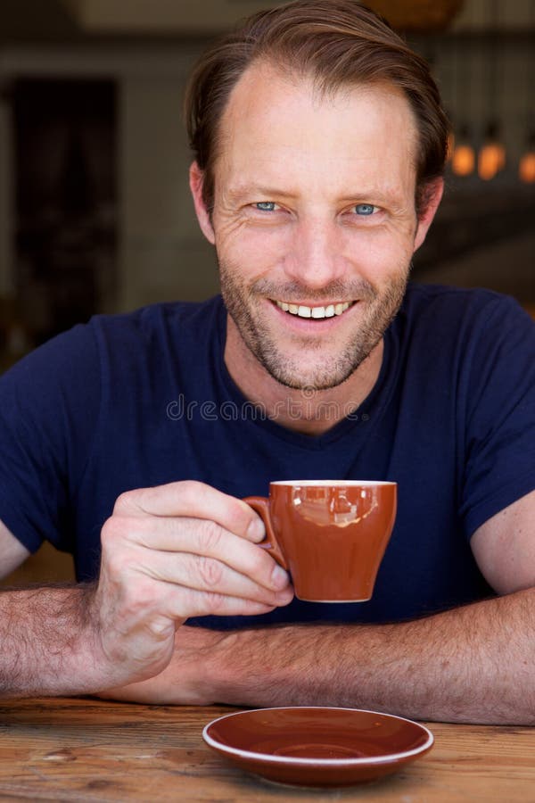 Handsome Man Drinking Coffee and Smiling Stock Photo - Image of happy ...