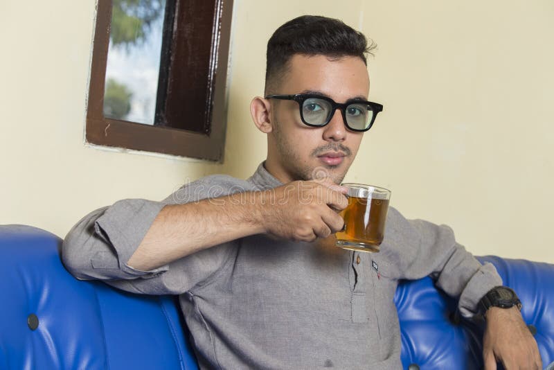 Handsome Man Drinking a Tea in His Room Stock Photo - Image of ...