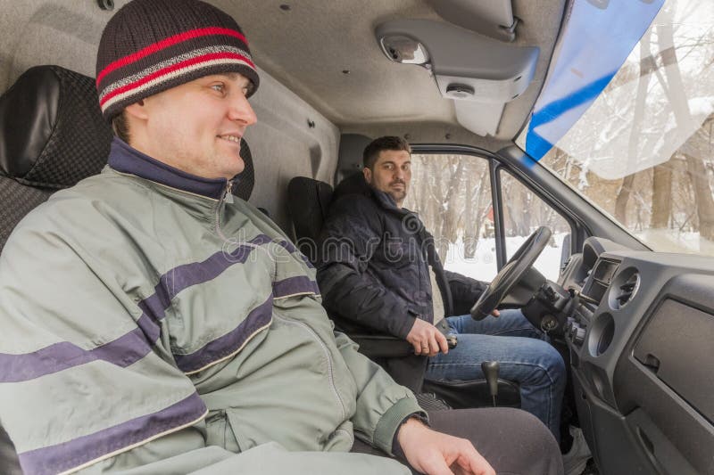 Handsome Man Driving in the Cab of a Large Truck Stock Image - Image of ...