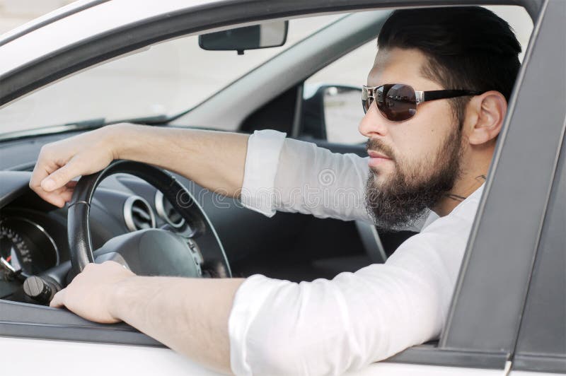 Handsome Man Driving a Car. Stock Image - Image of life, face: 70287875