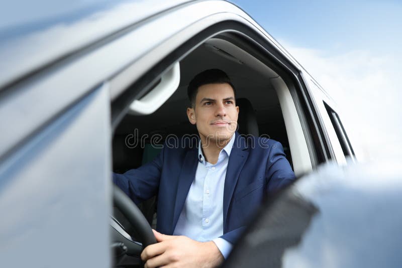 Handsome Man Driving His Modern Car, View from Outside Stock Photo ...