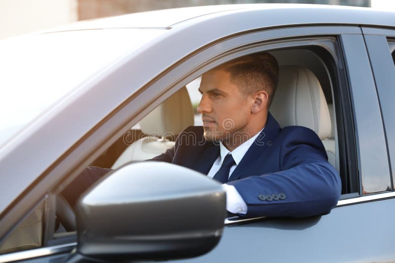 Handsome Man Driving His Modern Car, View from Outside Stock Photo ...