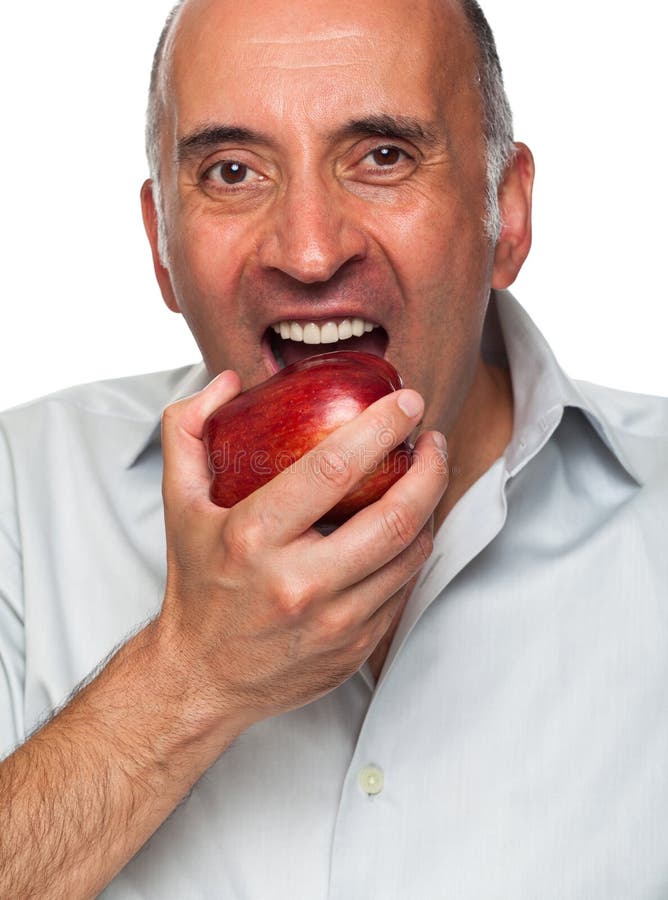 Handsome Man Eating an Apple Stock Image - Image of fruit, apple: 63476325