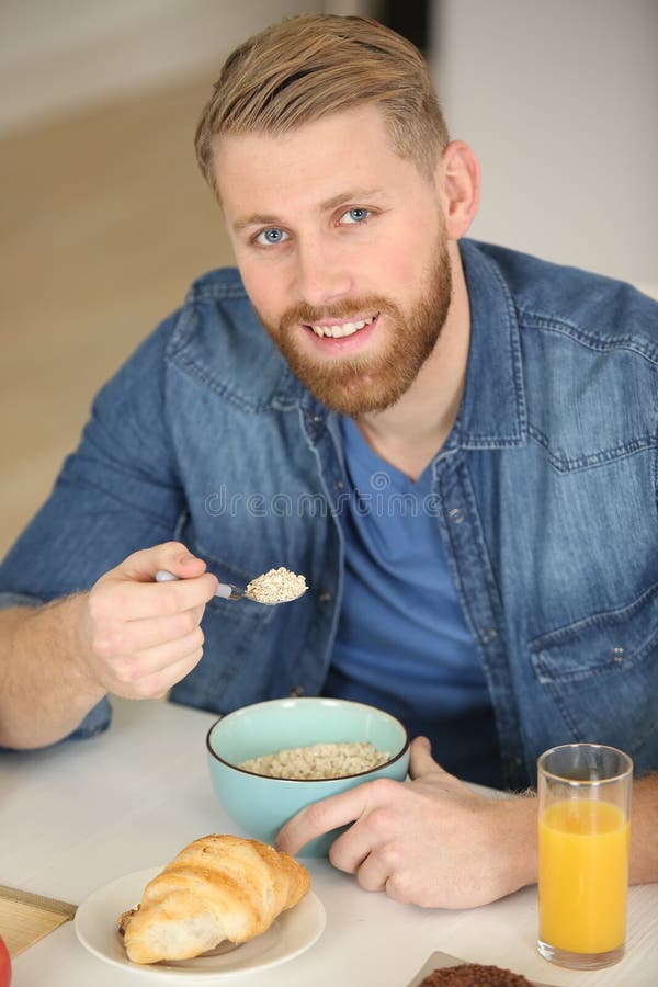 Handsome Man Eating Cereals for Breakfast at Home Stock Image - Image ...
