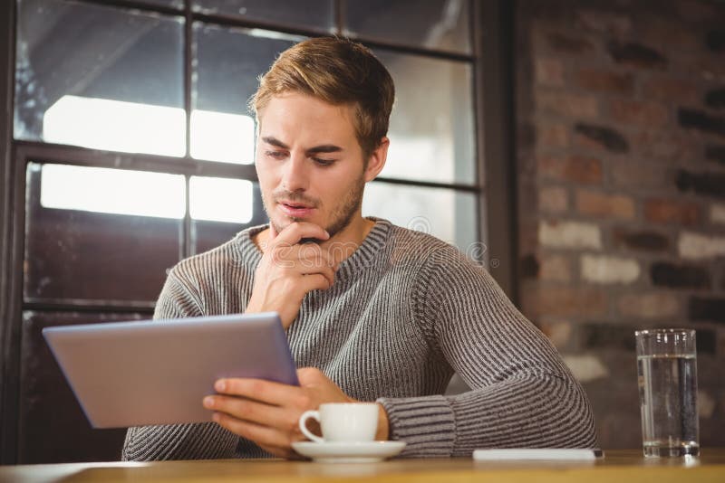 Handsome Man Focusing on Tablet Computer Stock Image - Image of grey ...
