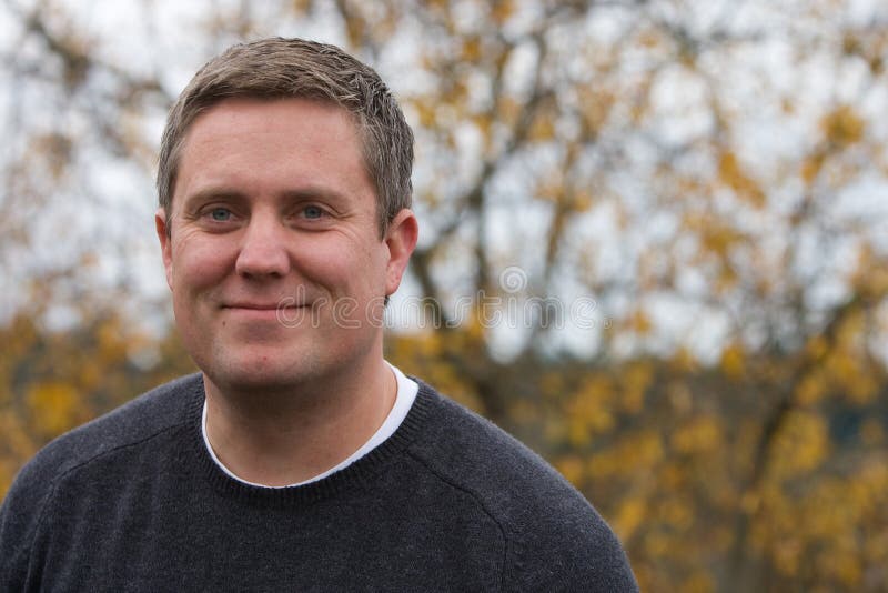 Handsome Man with a Friendly Smile Stock Photo - Image of kind, smiling ...