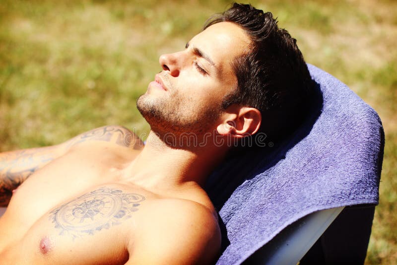 Handsome Man Getting Tan Stock Photos - Free & Royalty-Free Stock ...