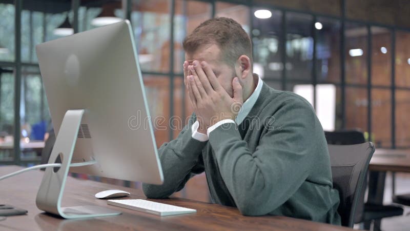 Handsome Man Getting Upset while Working on Computer Stock Photo ...