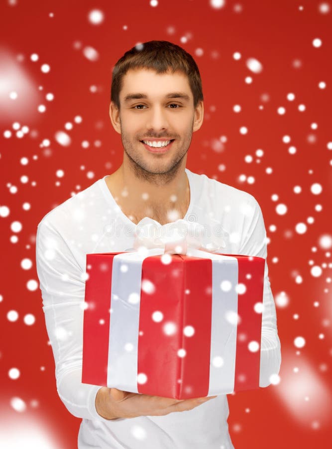 Handsome man with a gift stock image. Image of joyful - 36767855