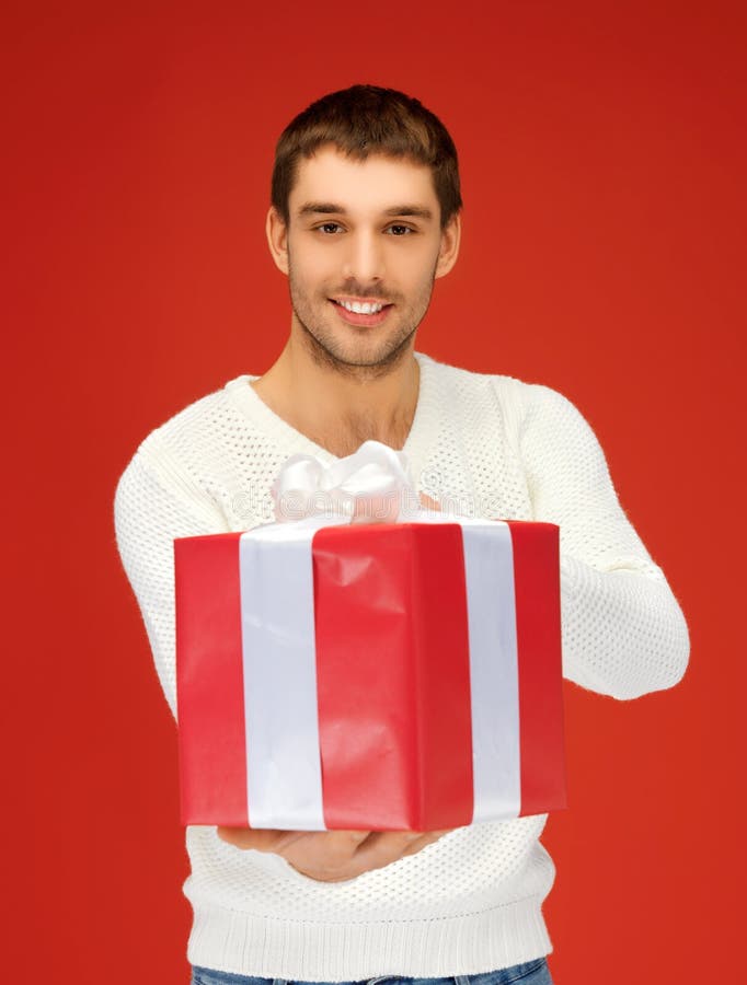 Handsome man with a gift stock image. Image of people - 39400109