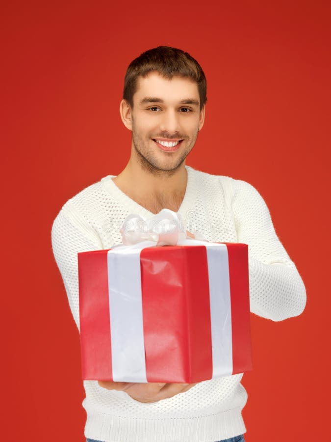 Handsome man with a gift stock photo. Image of clean - 39403846