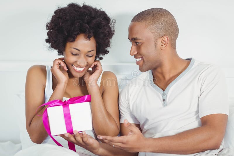 Man Giving a Present To His Girlfriend Stock Image - Image of happy ...