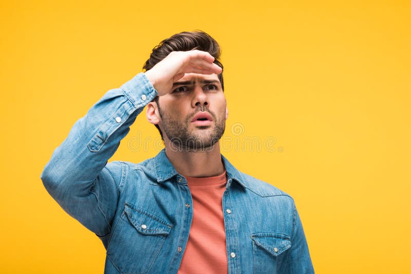 Handsome Man with Hand on Forehead Isolated on Yellow Stock Image ...
