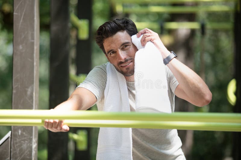 Handsome Man Having Break from Pull-ups on Horizontal Bar Stock Image ...