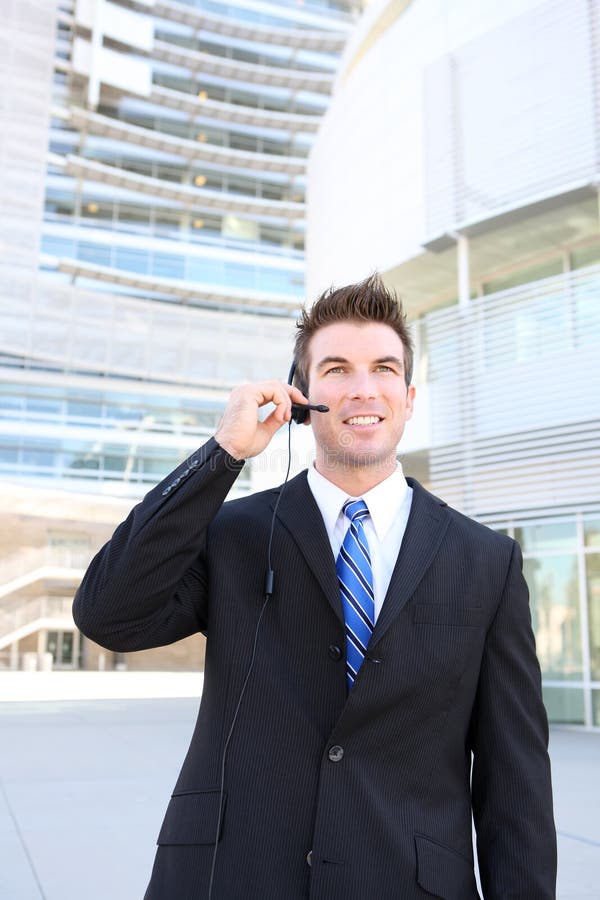 Handsome Man on Headset stock image. Image of customer - 16724645