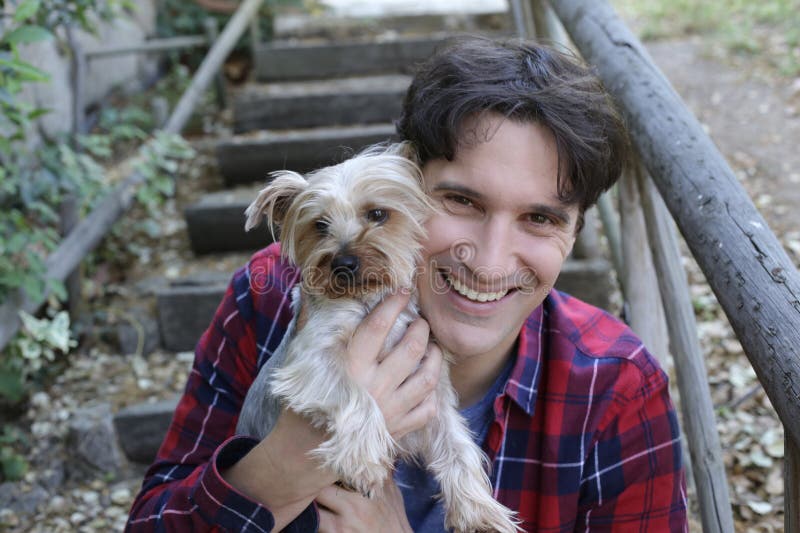 A Handsome Man and His Yorkshire Terrier Stock Photo - Image of french ...