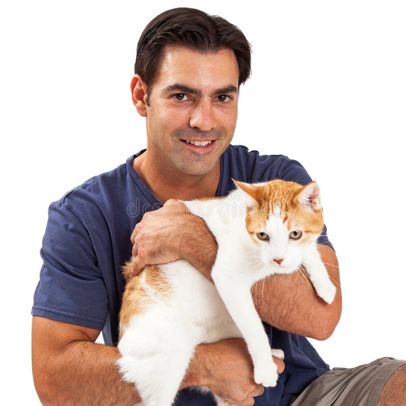 Handsome Man Holding a Cat stock photo. Image of space - 48531706