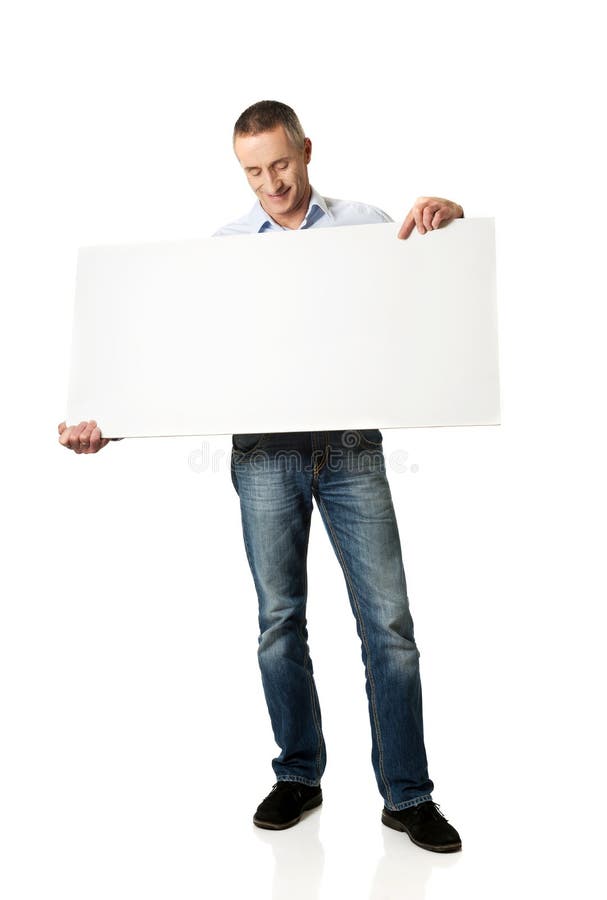 Handsome Man Holding an Empty Banner Stock Photo - Image of advertise ...