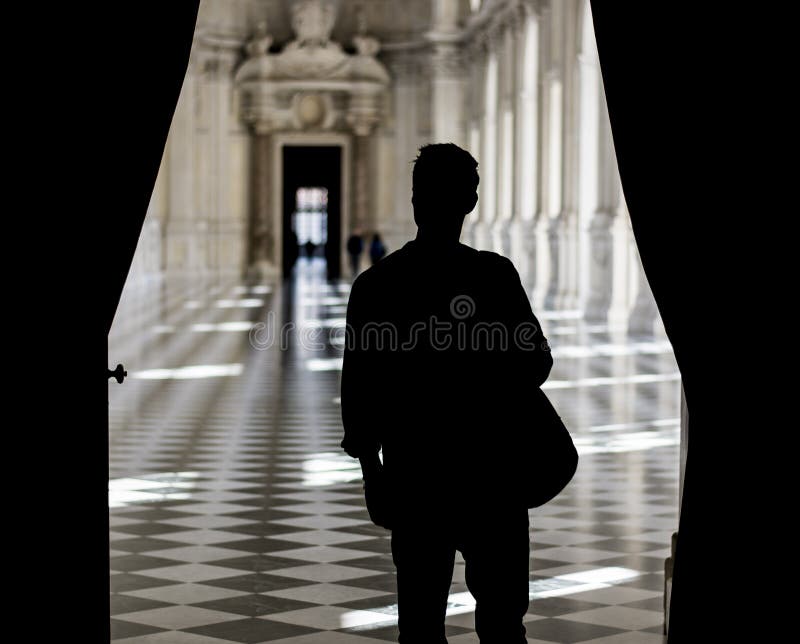 Handsome Man Holding a Guide Inside a Museum Stock Image - Image of ...