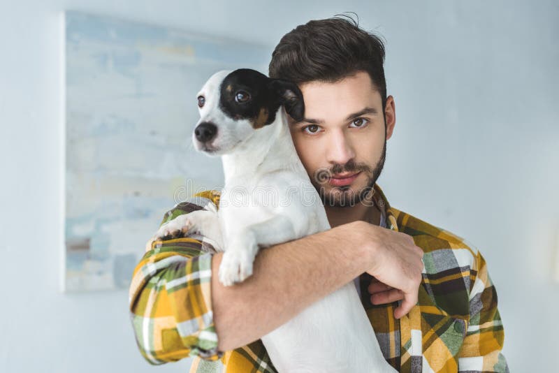 Handsome Man Holding Jack Russell Stock Photo - Image of caucasian ...
