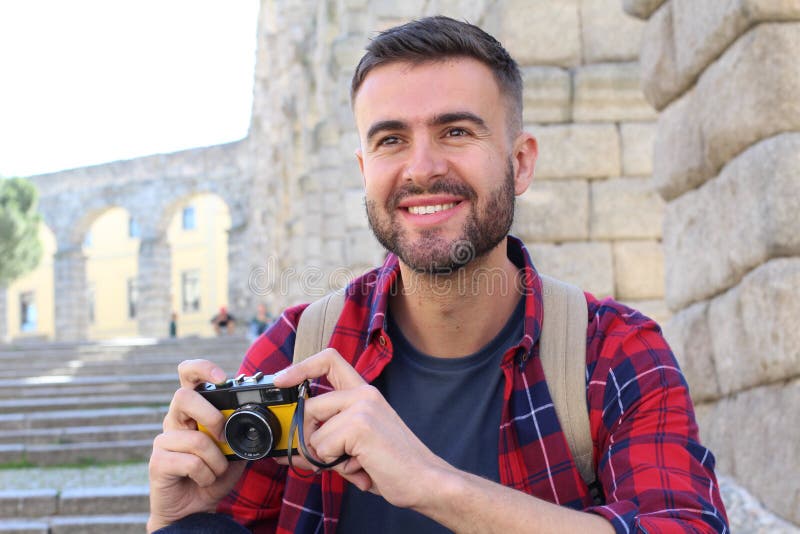Handsome Man Holding a Vintage Camera during Trip Stock Photo - Image ...