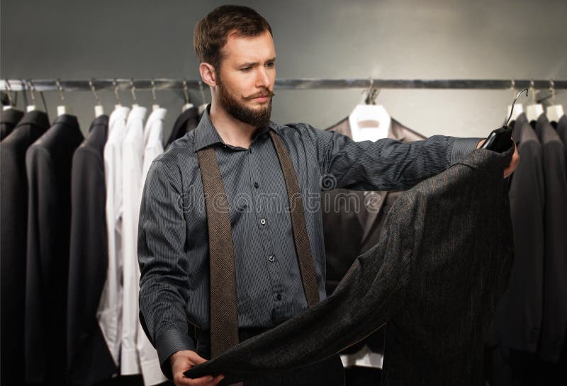 Handsome man with jacket stock image. Image of doubt - 39554167